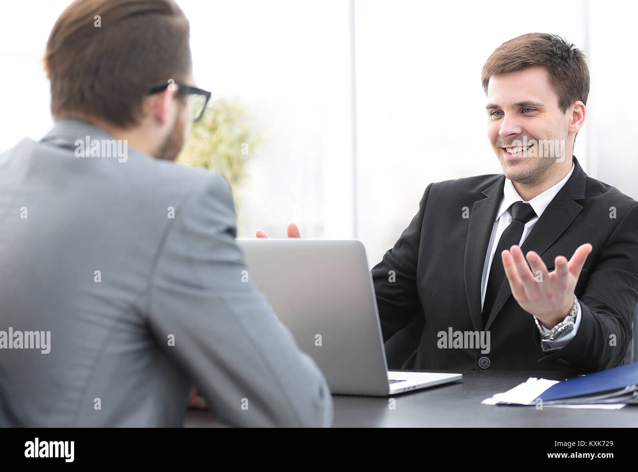 employees of the company talking at his workplace Stock Photo - Alamy