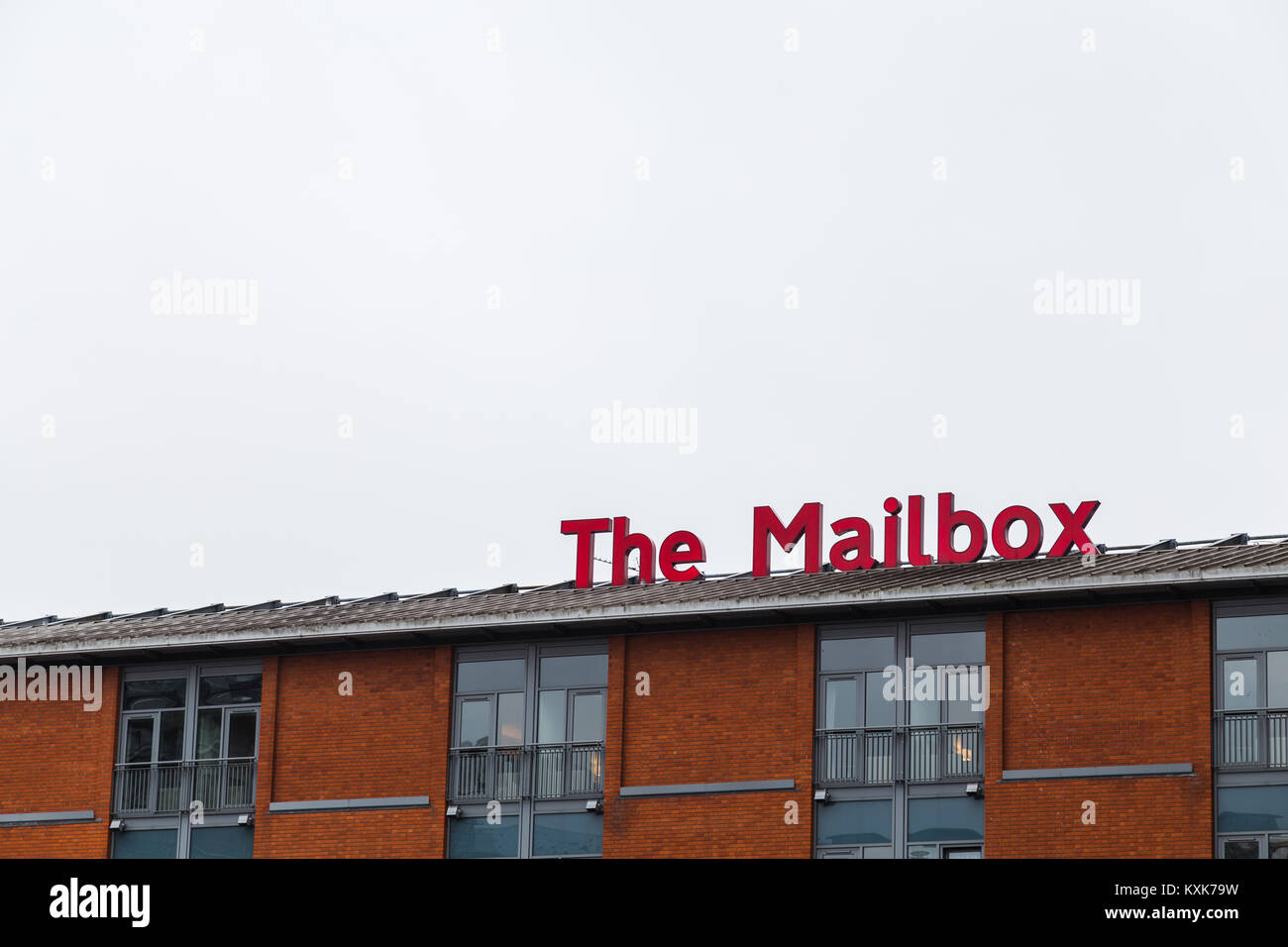 Red sign above the new Mailbox shopping complex which sits on the edge ...