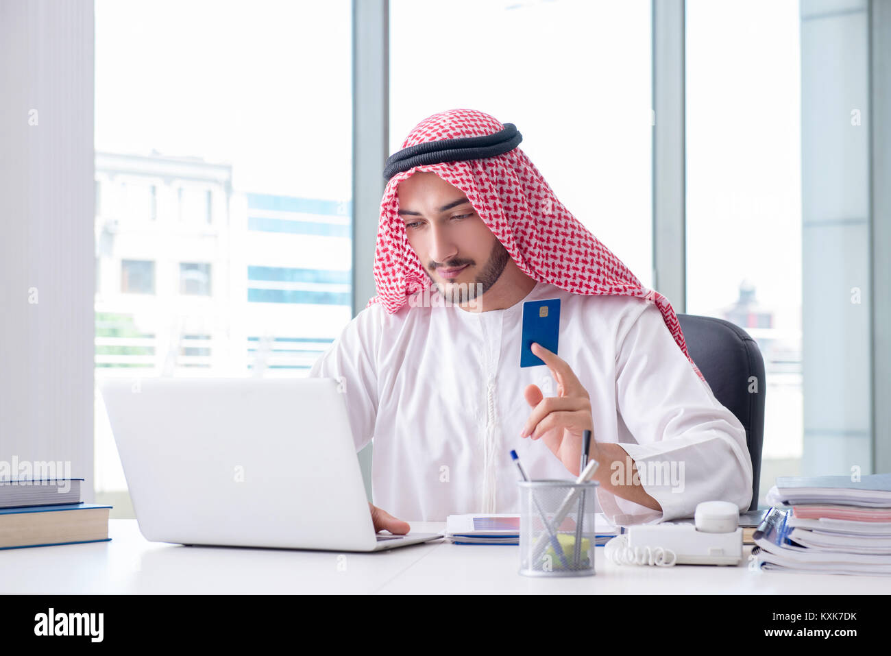 Arab businessman working in the office Stock Photo - Alamy