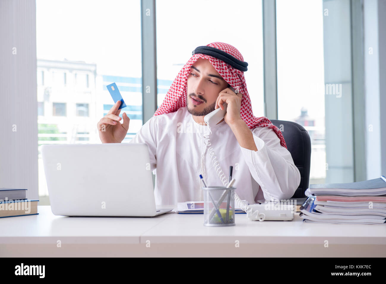 Arab businessman working in the office Stock Photo - Alamy