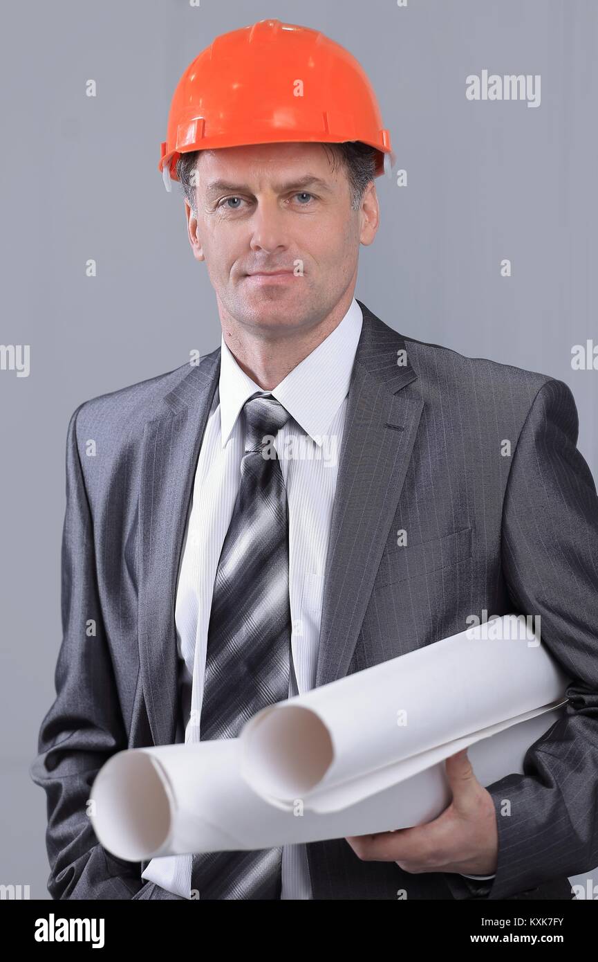 portrait of professional architect with the project of a new building ...