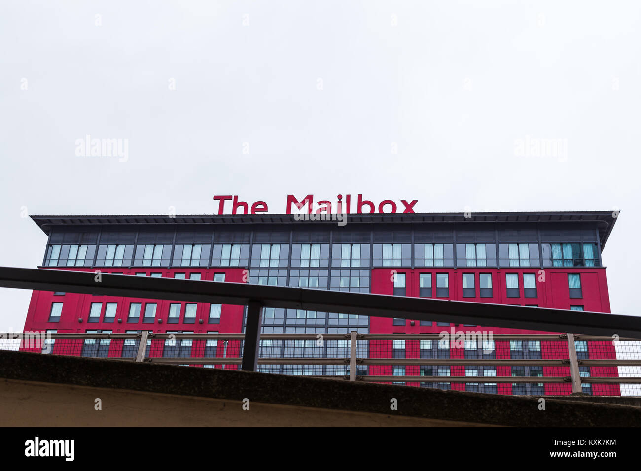 The vivid red coloured facades and sign on the Mailbox shopping centre ...