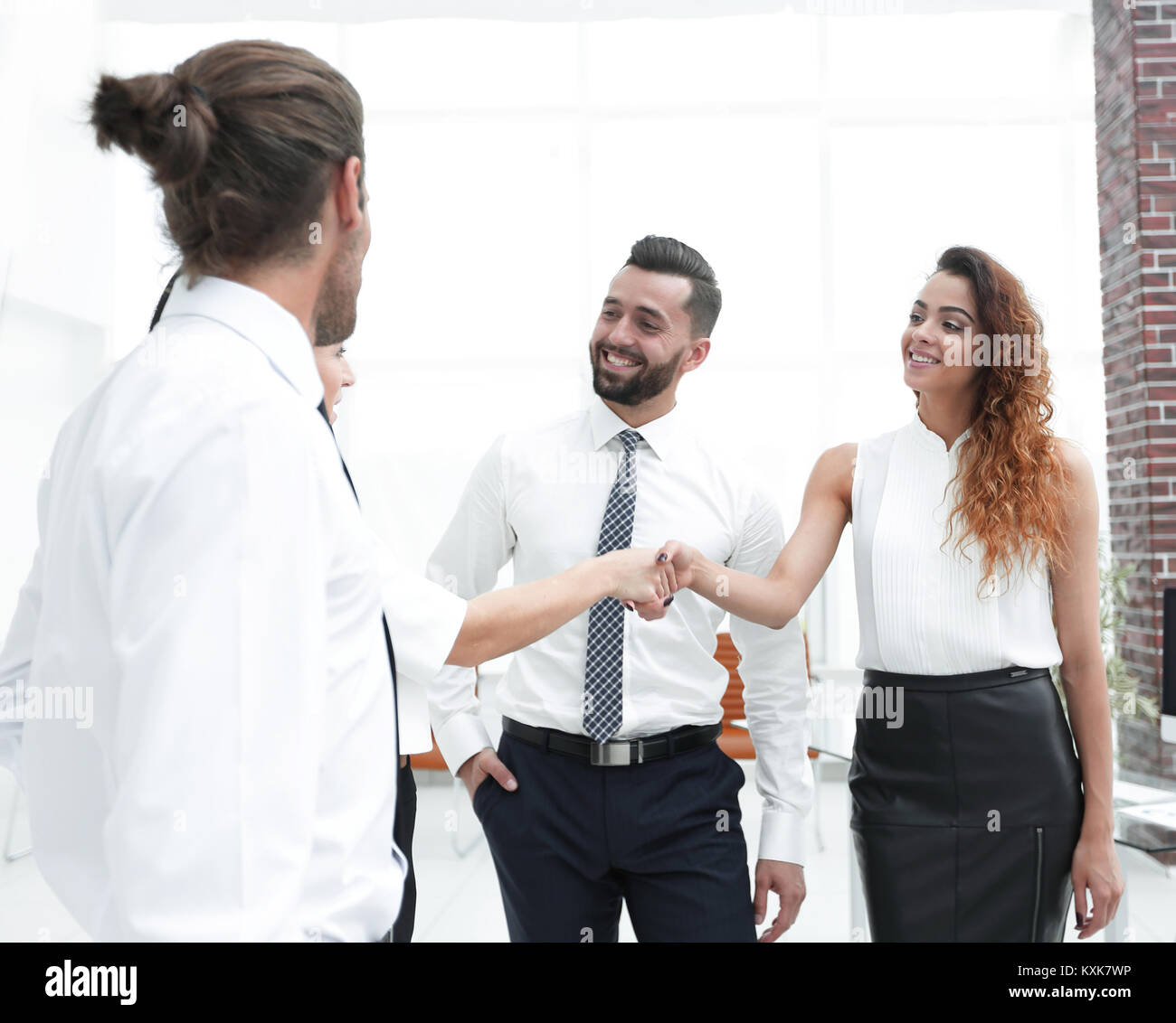 business women greet each other with a handshake Stock Photo - Alamy