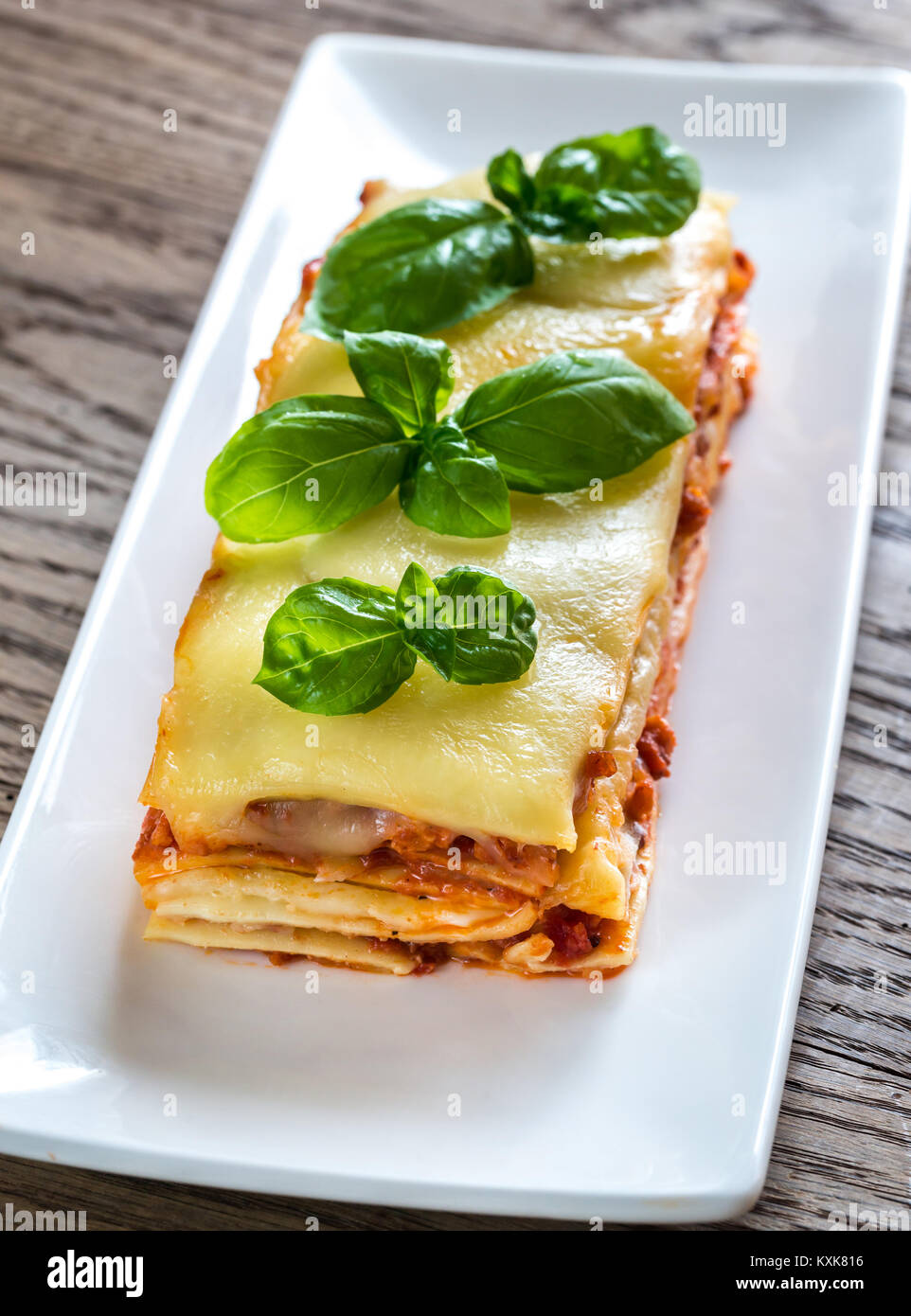 Portion of classic lasagne Stock Photo - Alamy