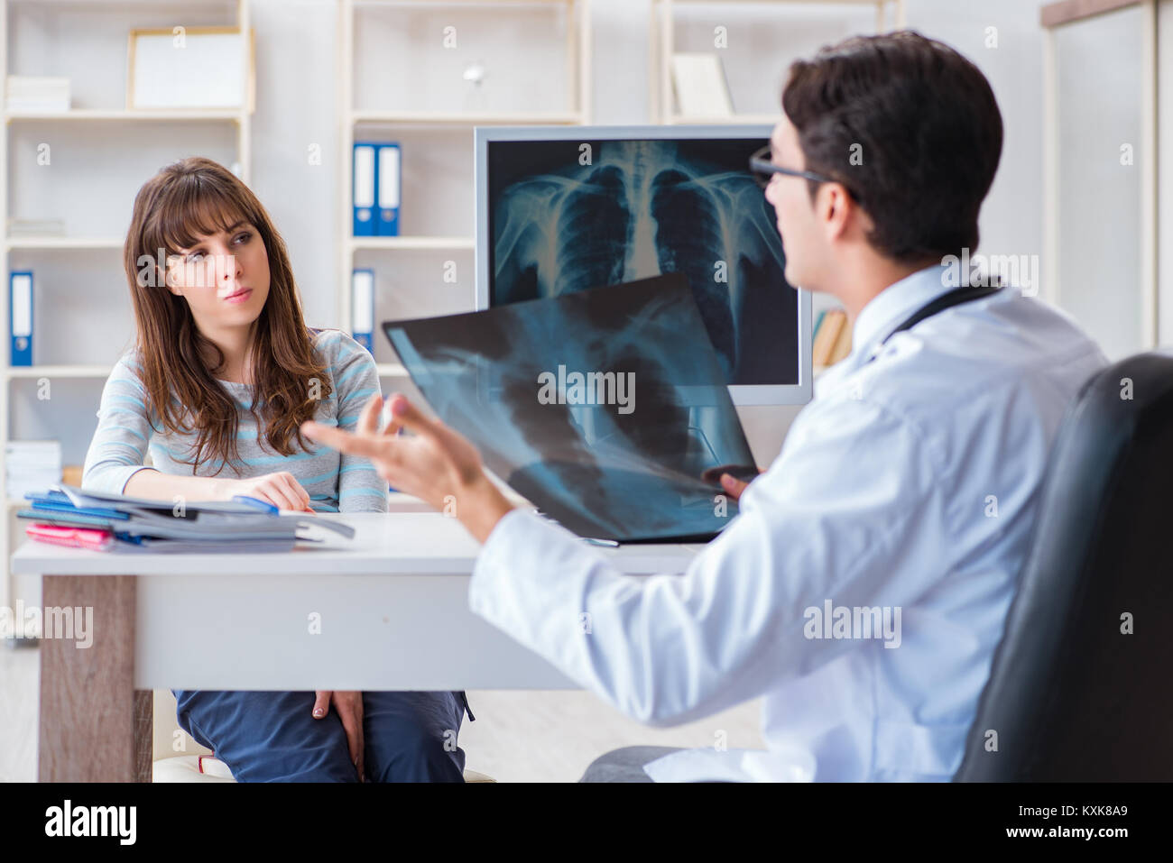 Young woman visiting radiologist for x-ray exam Stock Photo - Alamy