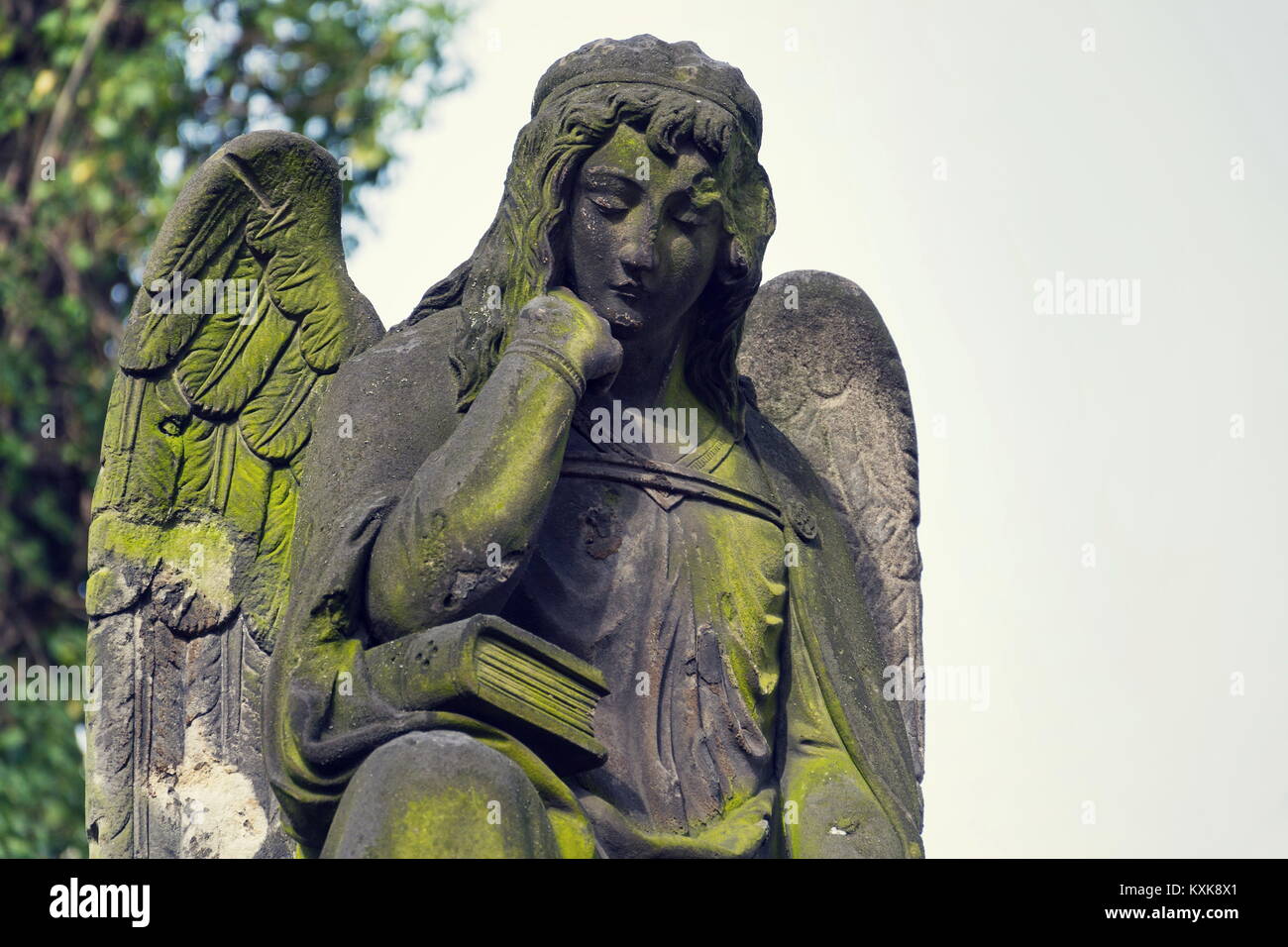 Thinking broody angel statue on Malostransky cemetery, Prague, Czech ...
