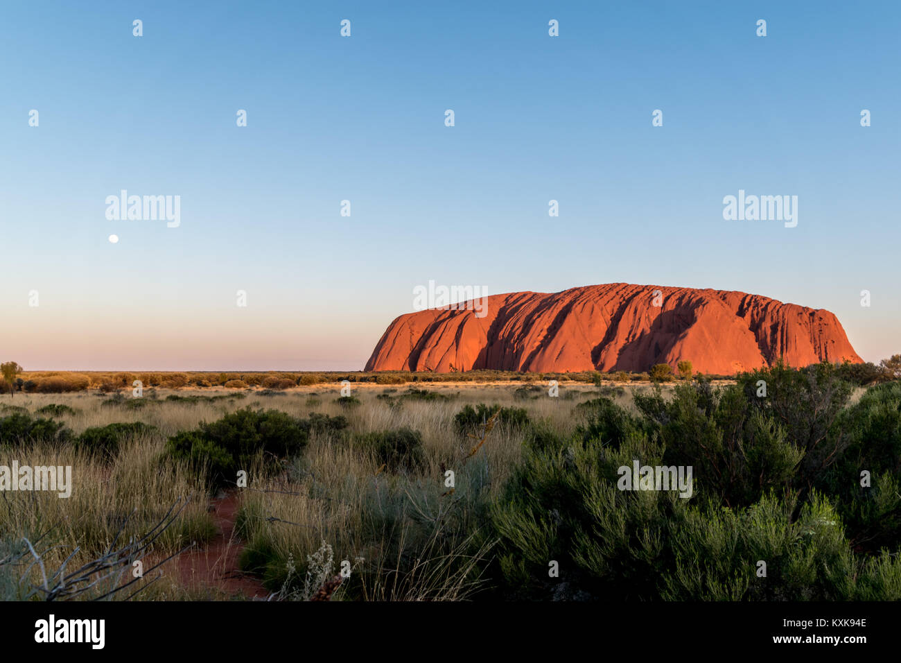 Uluru at sunset Stock Photo - Alamy