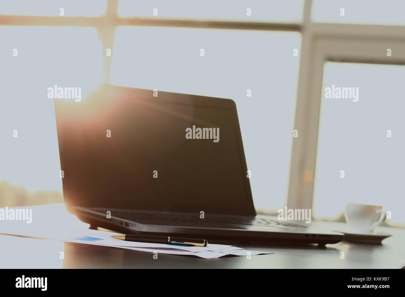 laptop in the workplace in the early morning Stock Photo - Alamy