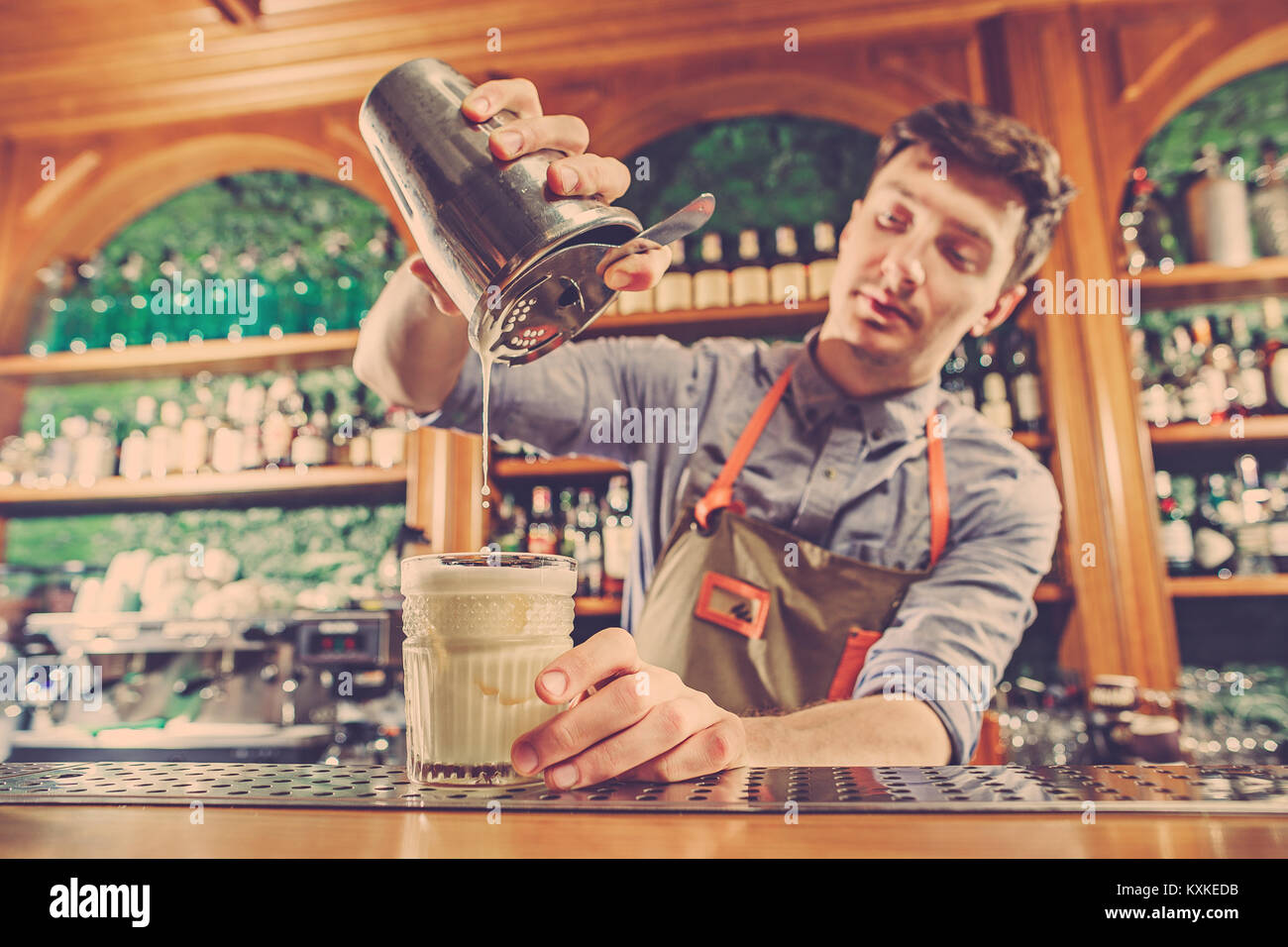 Waiter making cocktail hi-res stock photography and images - Alamy
