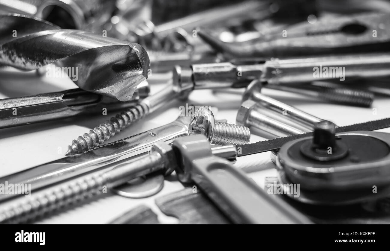 Working metal tools of silver color on the background Stock Photo - Alamy