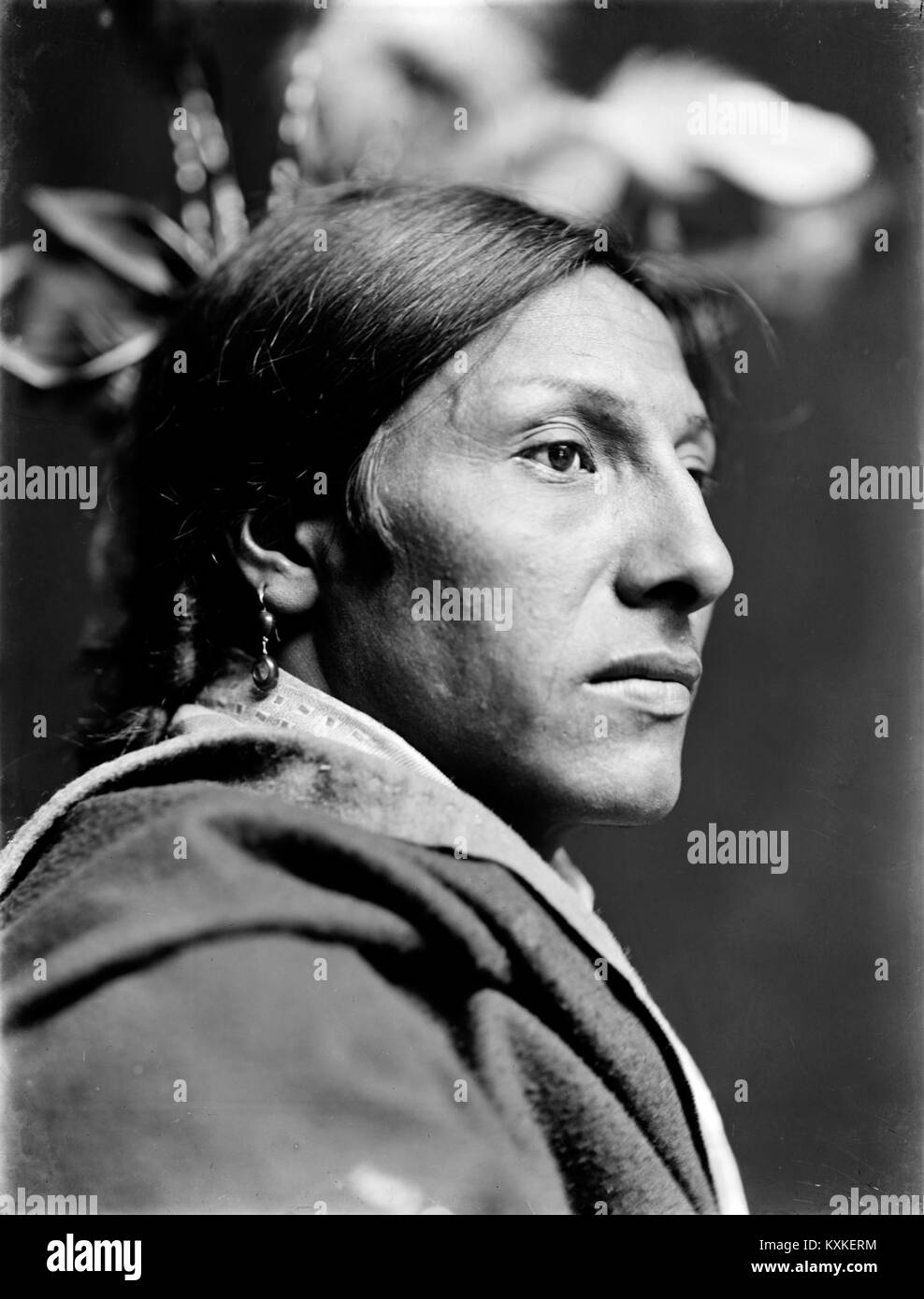 A portrait of Amos Two Bulls, a member of the Dakota Sioux, taken by ...