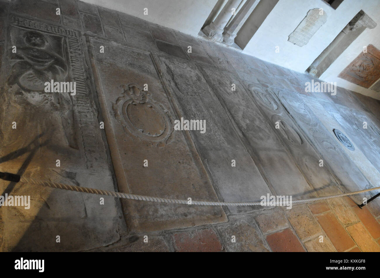 This photograph depicts the grave slabs in the sixth bay of the west ...