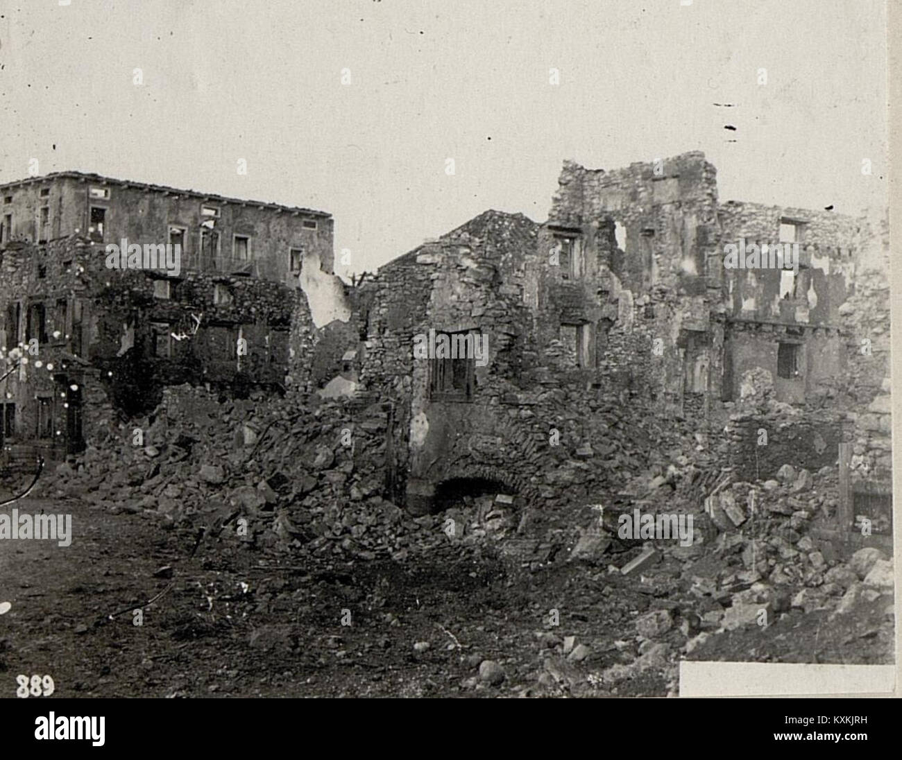 A historical photograph of destroyed buildings in Asiago, Italy ...