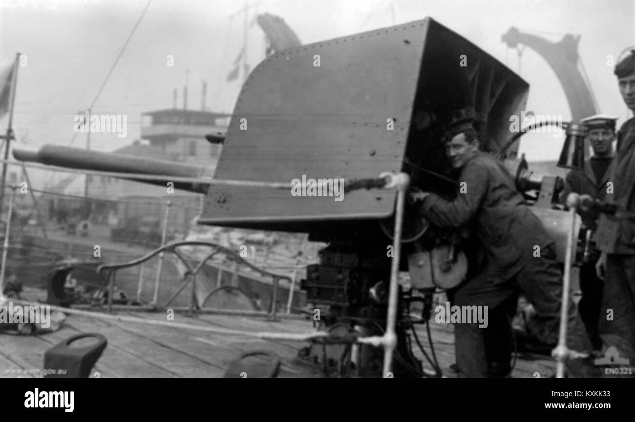 This image shows the BL 4-inch Mk VIII gun mounted on the HMAS Huon, a ...