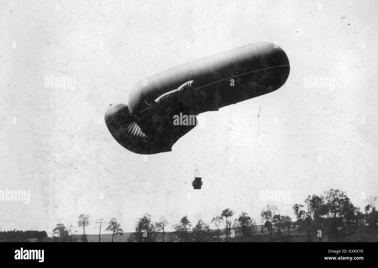 A photograph shows a fixed Drachen-type observation balloon used by the ...