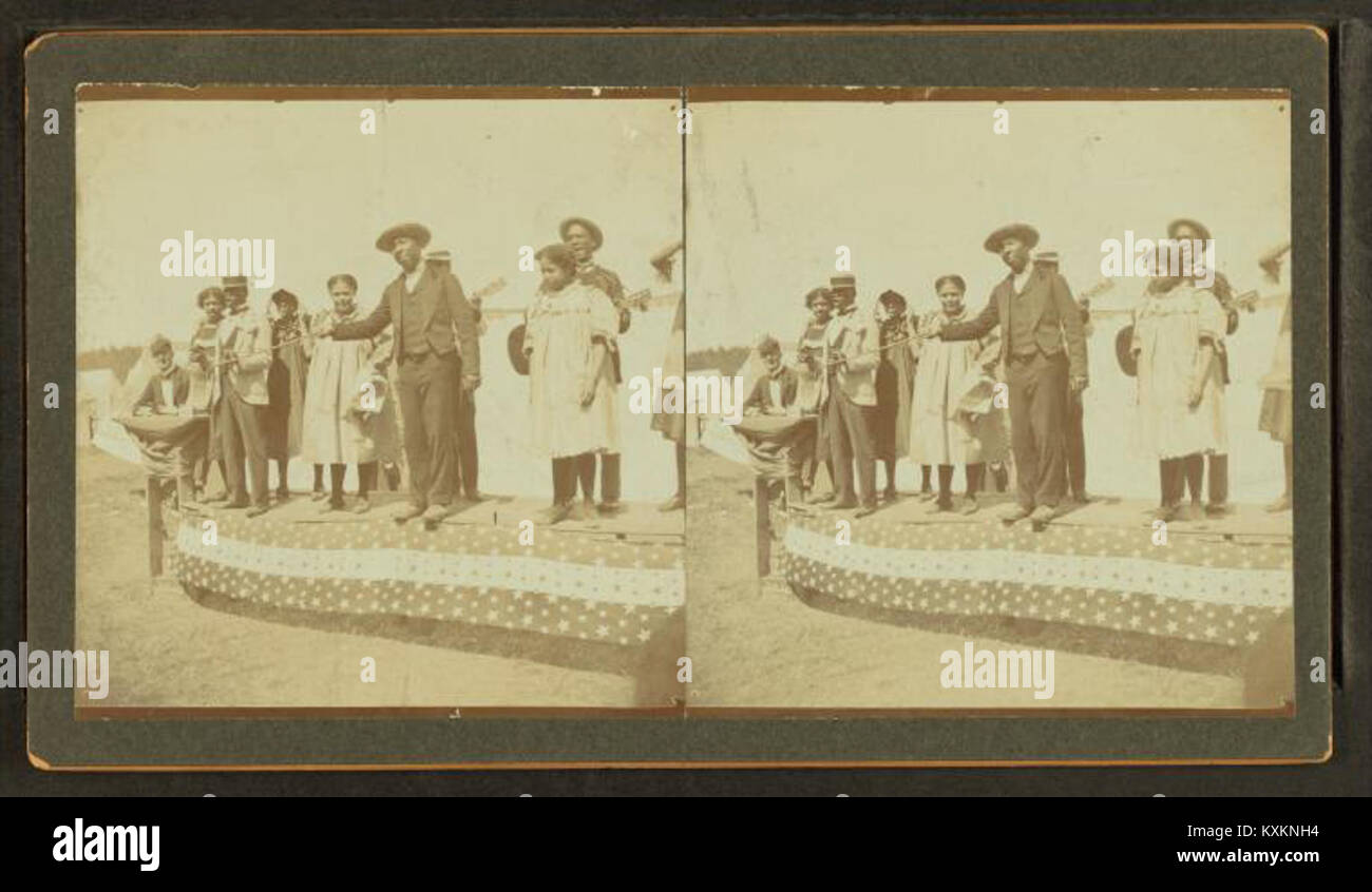 A side show at Chatham Fair. (Musical performers on a small outdoor ...