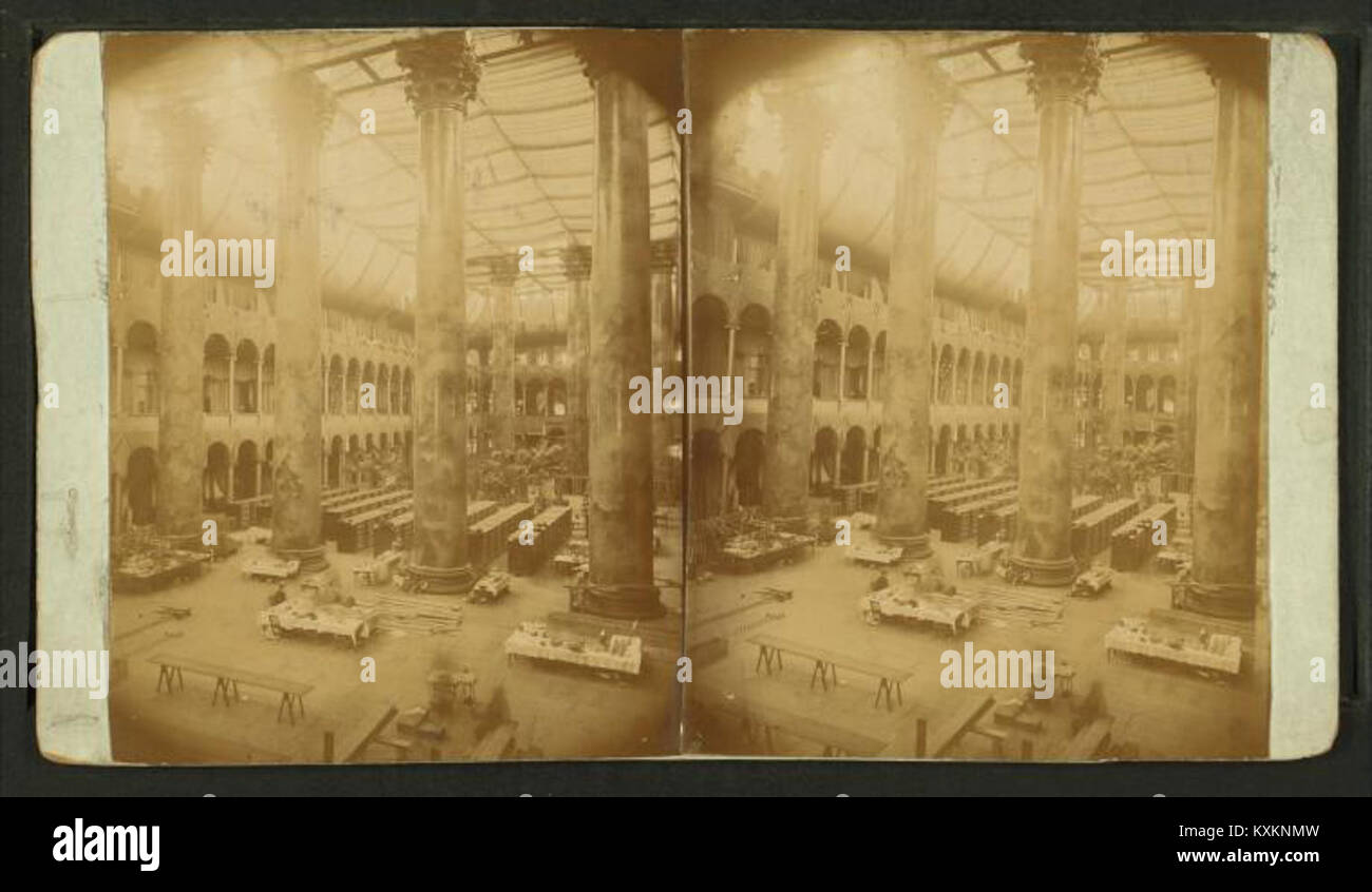 A view of the Pension building with tables set up for a reception, from ...