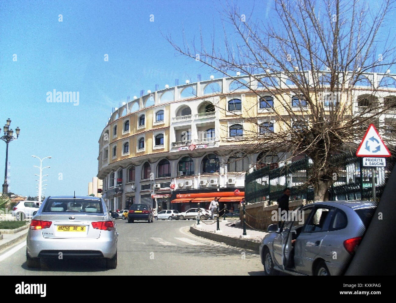 Photograph of a market scene in Médéa, Algeria, showcasing local goods ...