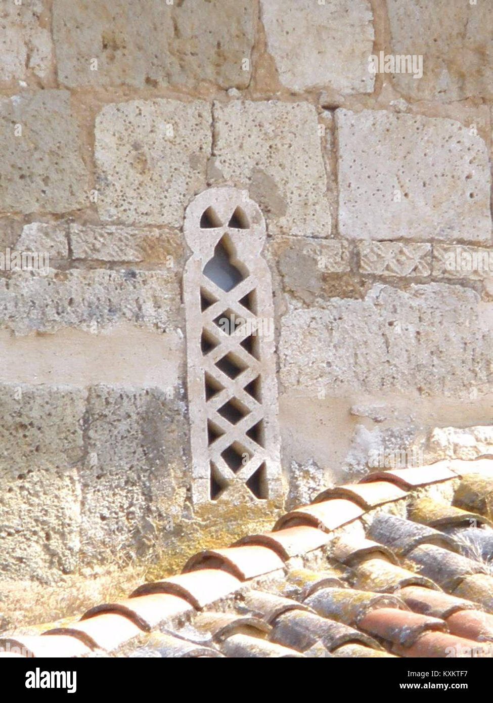 A photograph of the Basilica of San Juan Bautista in Baños de Cerrato ...