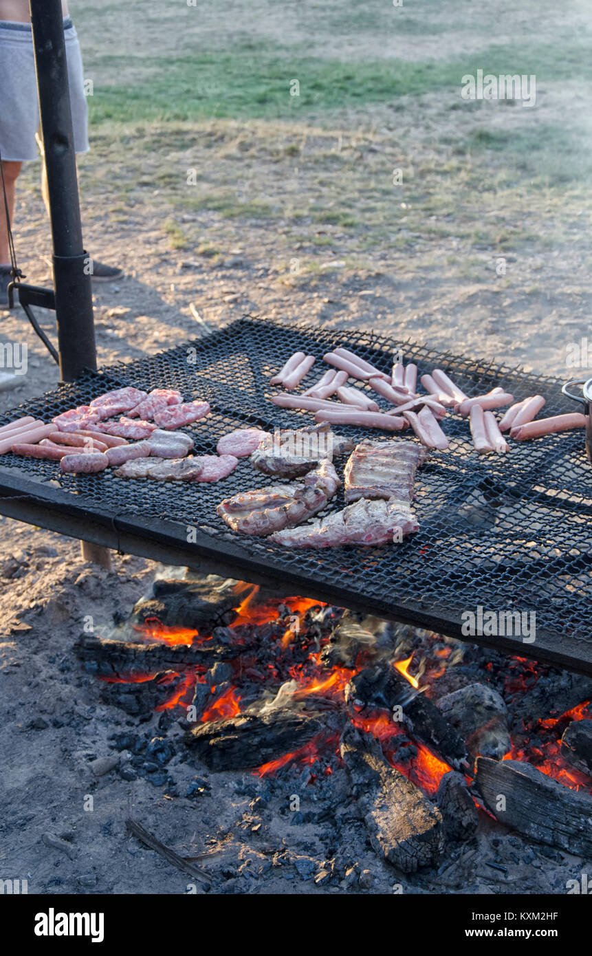 View of various types of meat roasted on the fire Stock Photo - Alamy