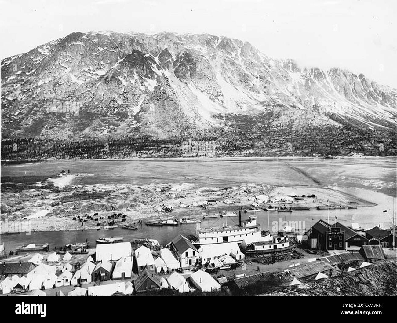 The photo titled 'Bennett on Bennett Lake' depicts a historical scene ...