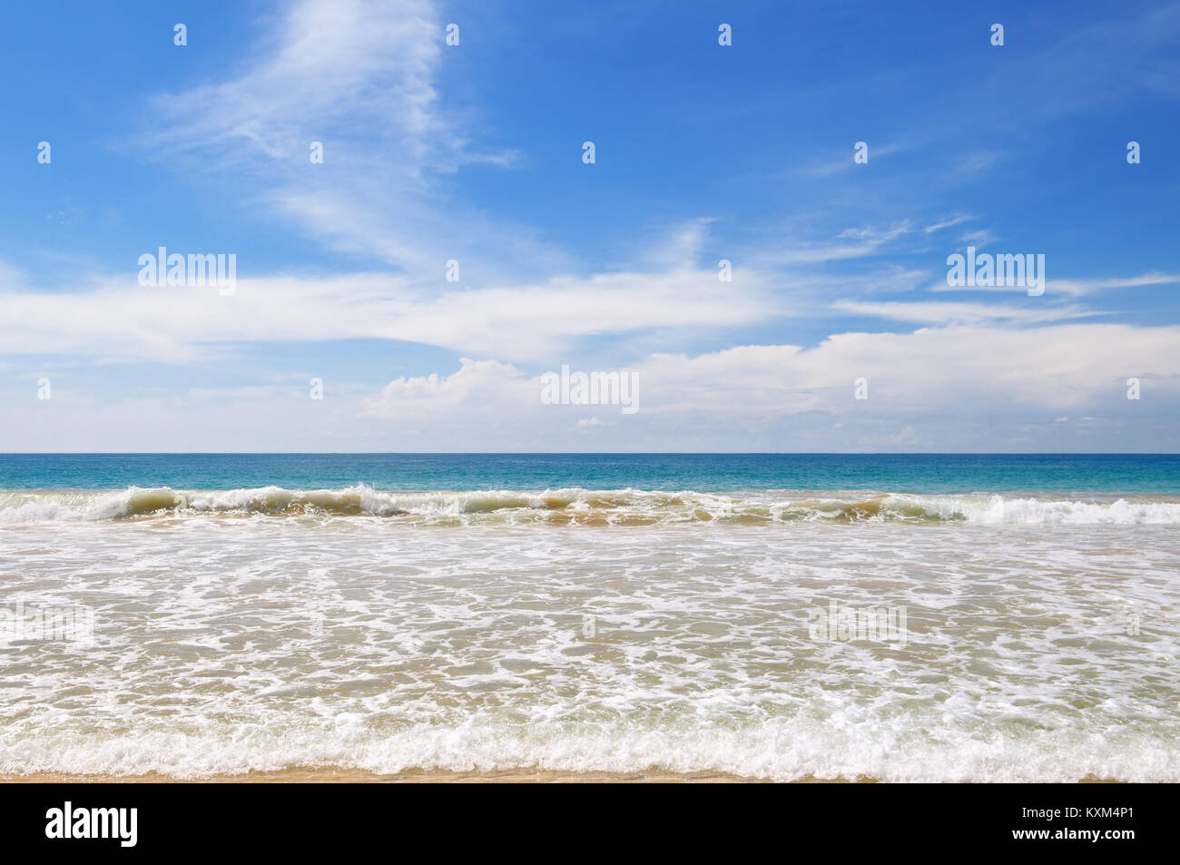 ocean, picturesque beach and blue sky Stock Photo - Alamy
