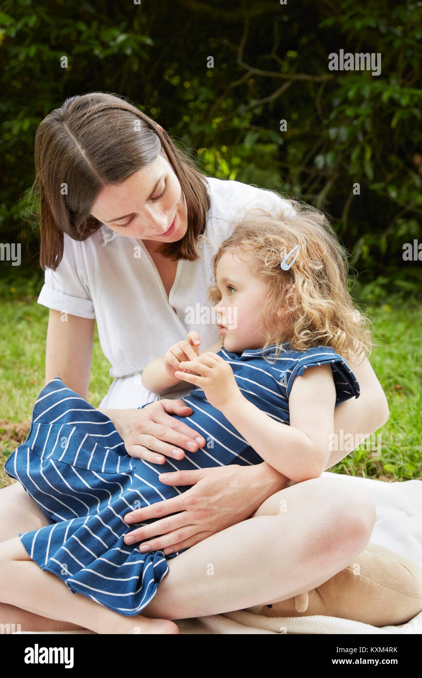 Legs on his lap hi-res stock photography and images - Alamy