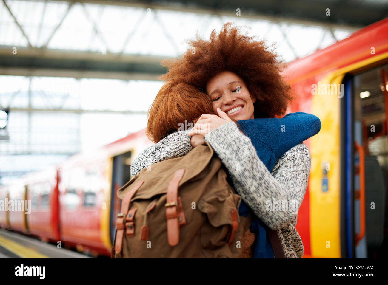 Friends meeting up in London Stock Photo - Alamy