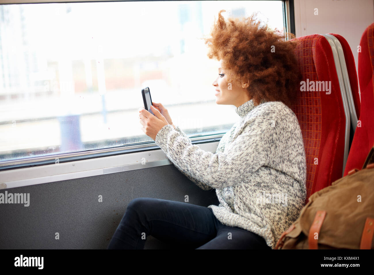 Mobile phone train hi-res stock photography and images - Alamy