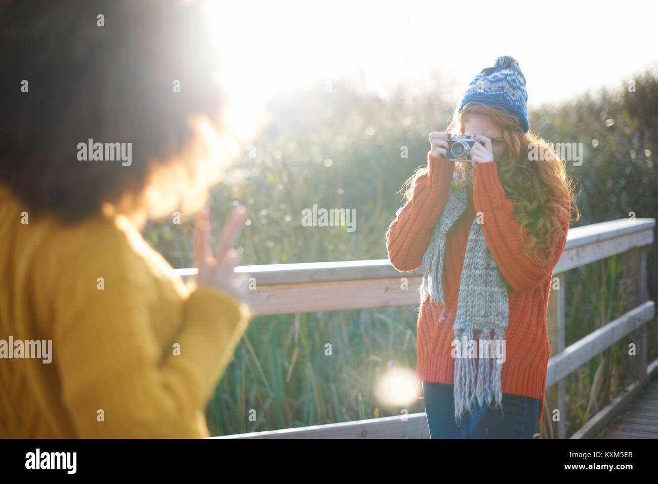 Woman photographing from camera hi-res stock photography and images - Alamy