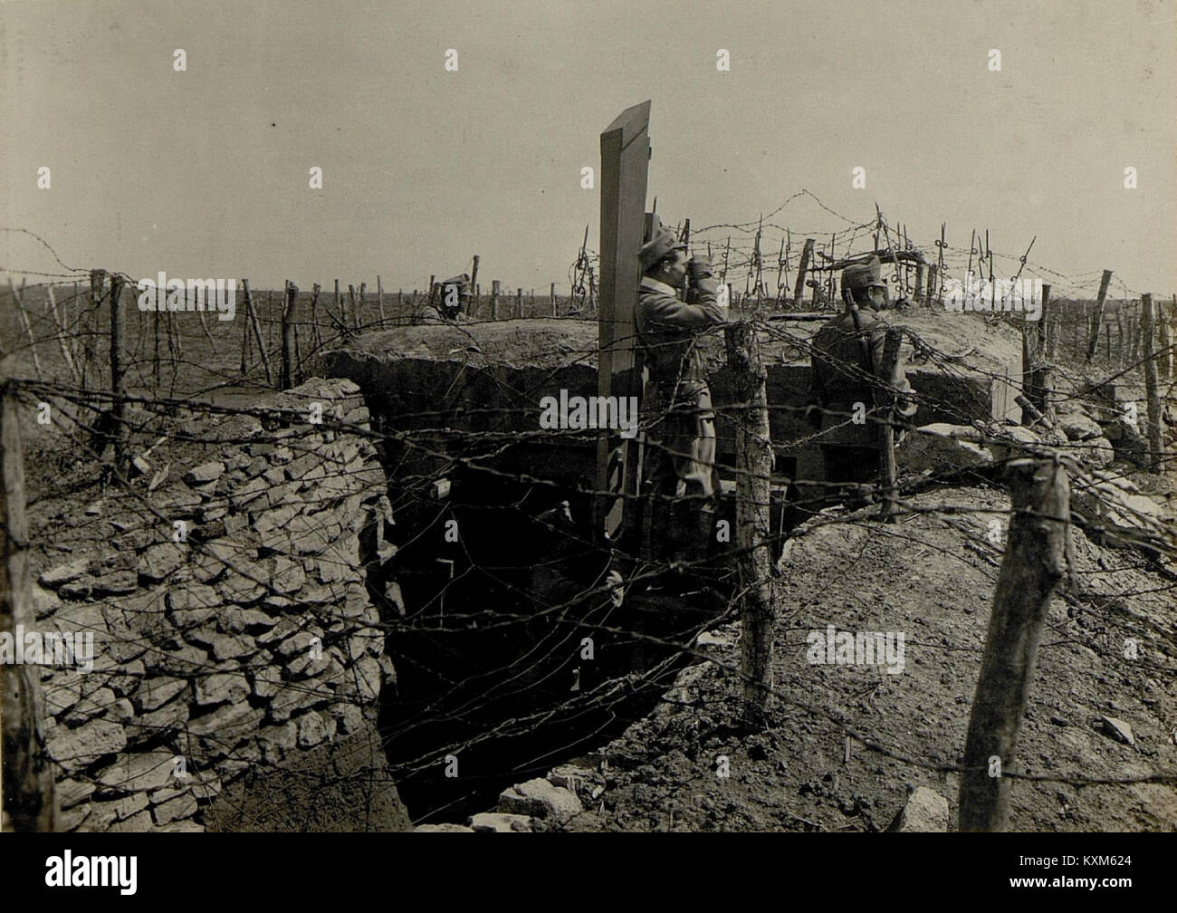 A photograph depicting a concrete machine gun emplacement in the Sosnow ...