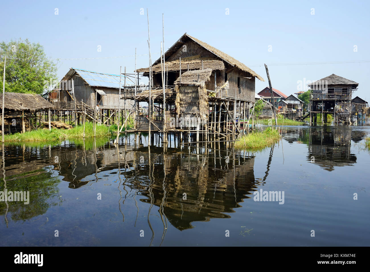 NYAUNGSHWE, MYANMAR - CIRCA APRIL 2017 Wooden houses on the Inle lake ...