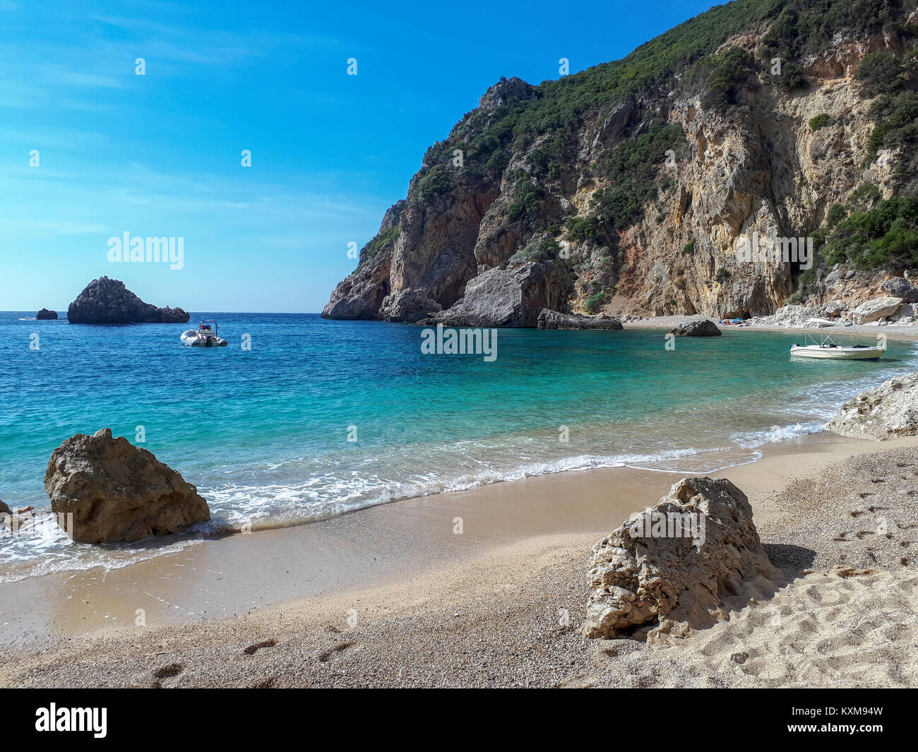 Lonely beach only accessible by boat between cliffs in the vicinity of ...