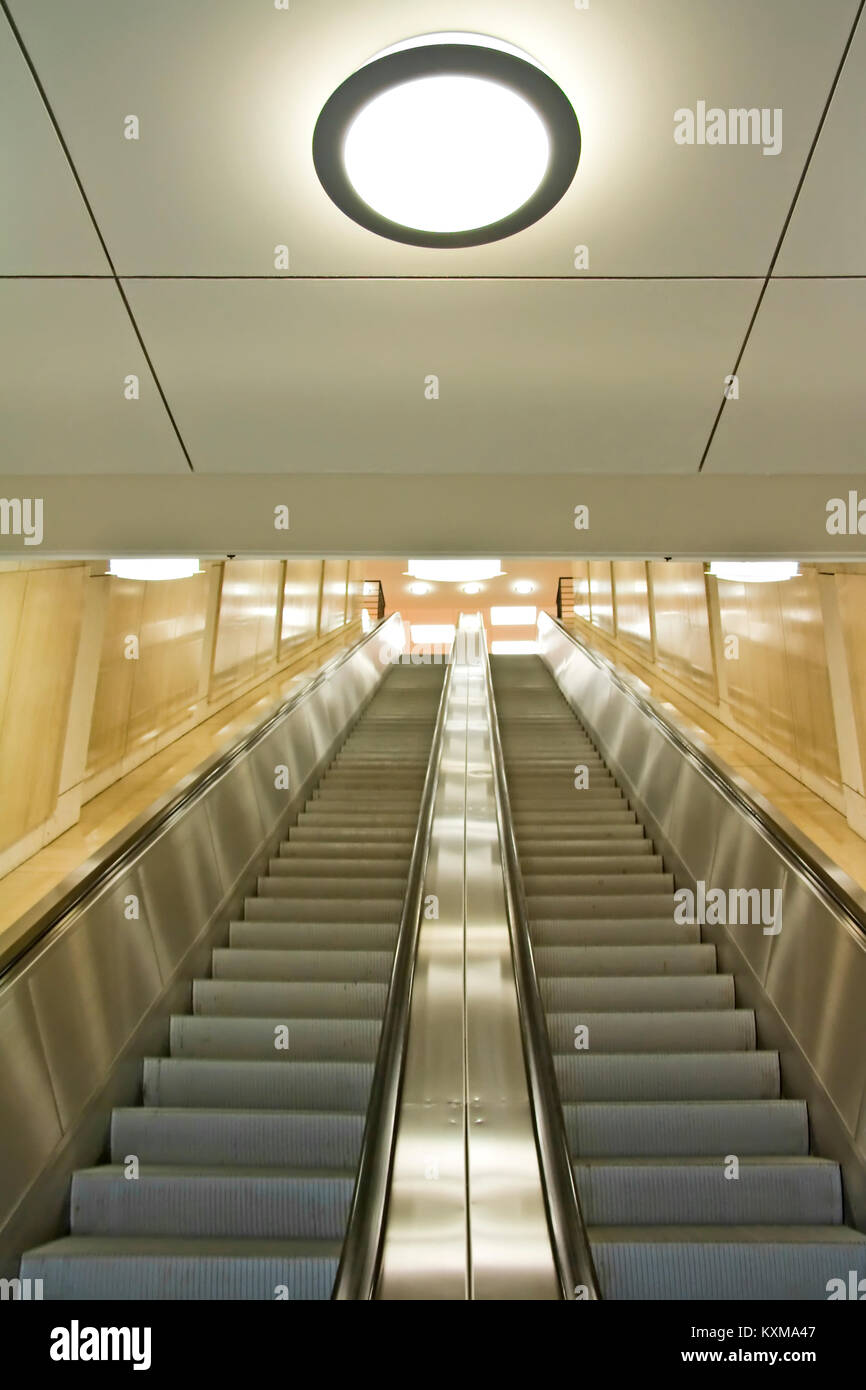 Modern interior with escalator Stock Photo - Alamy