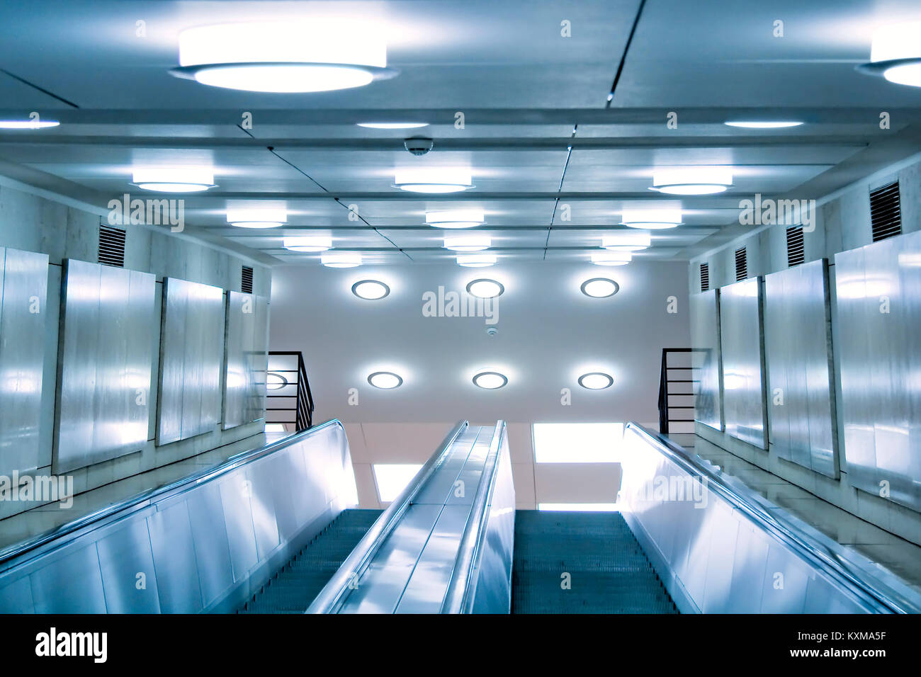 Modern interior with escalator Stock Photo - Alamy
