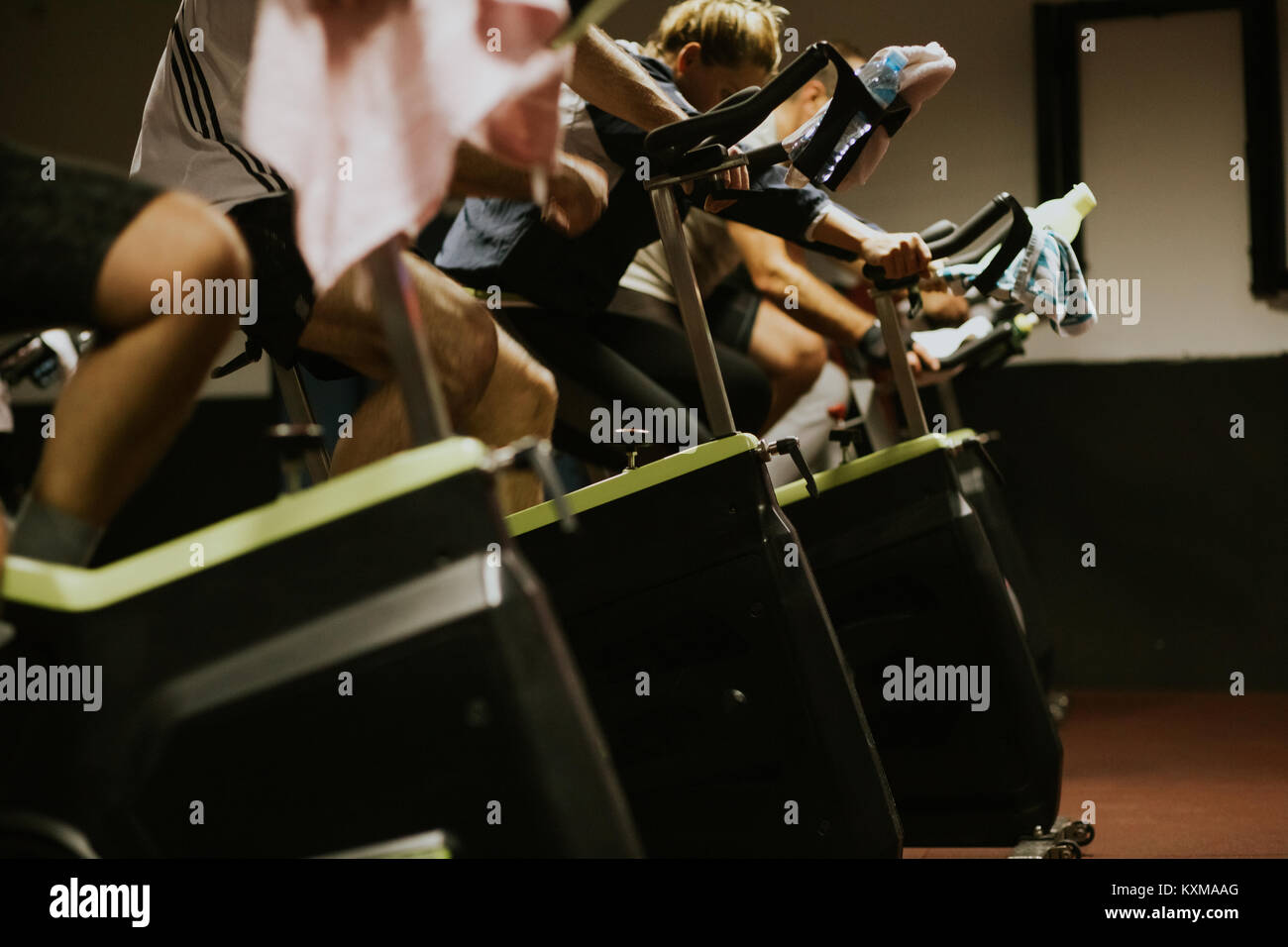 cycling class group. spin class workout Stock Photo - Alamy