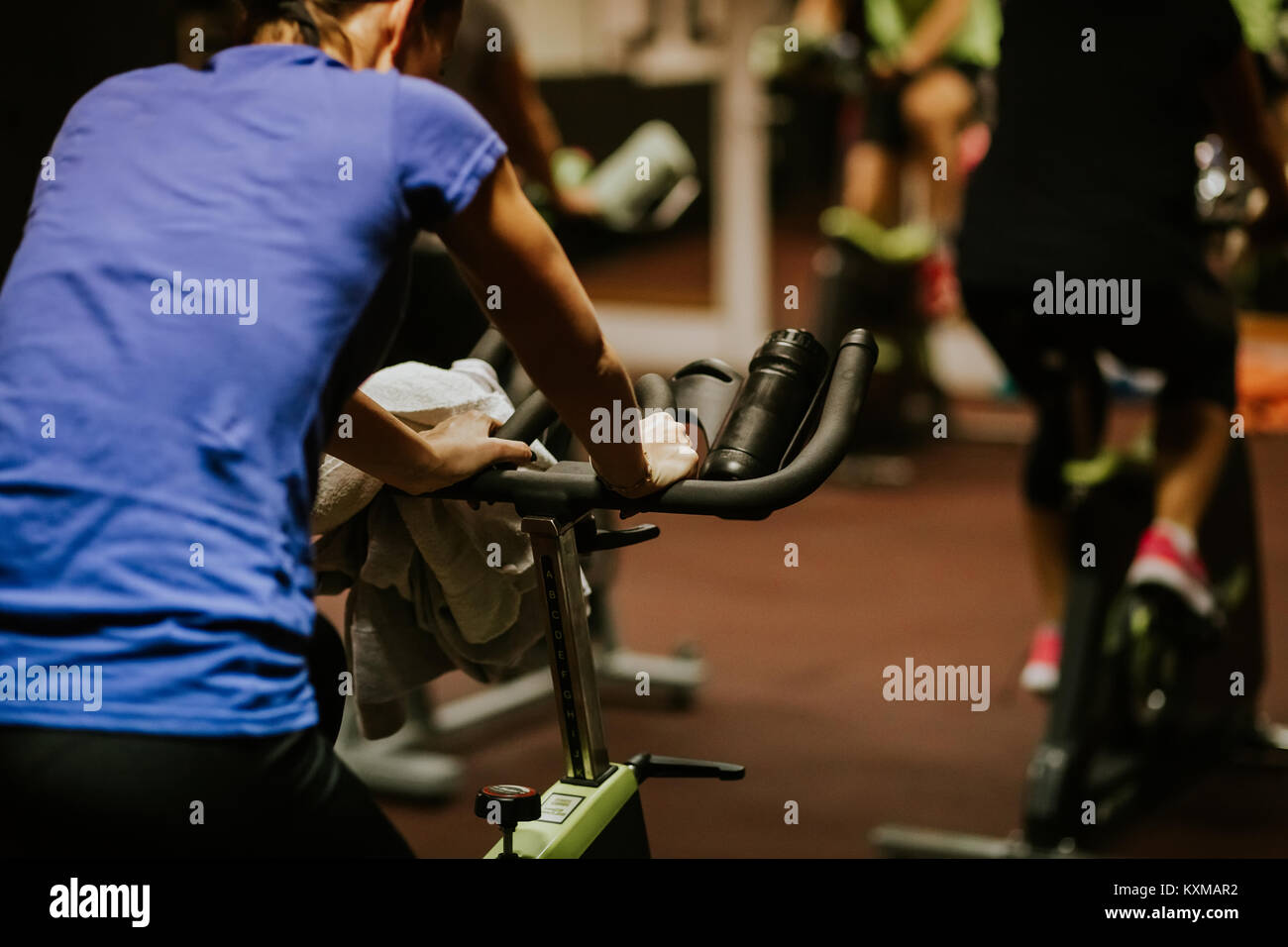 cycling class group. spin class workout Stock Photo - Alamy