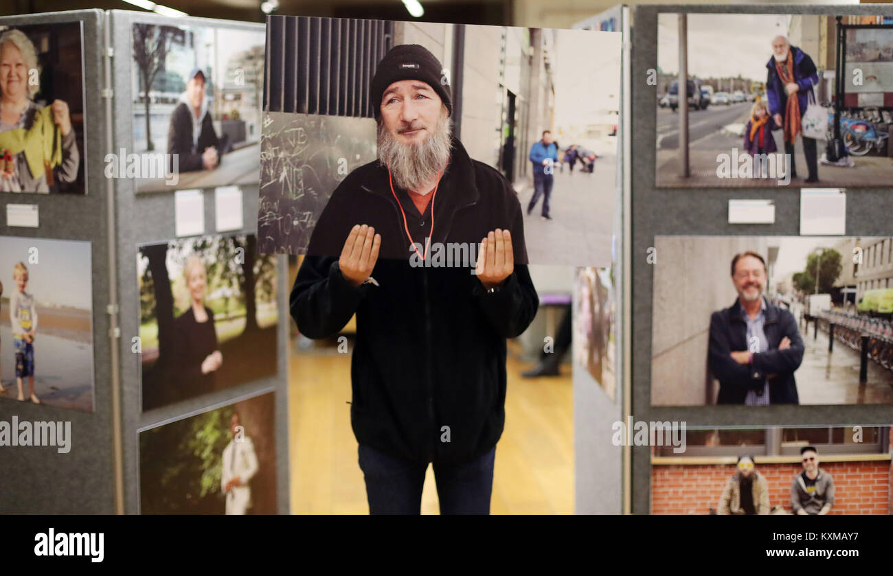 Photographer Peter Varga holding a print from his Humans of Dublin ...