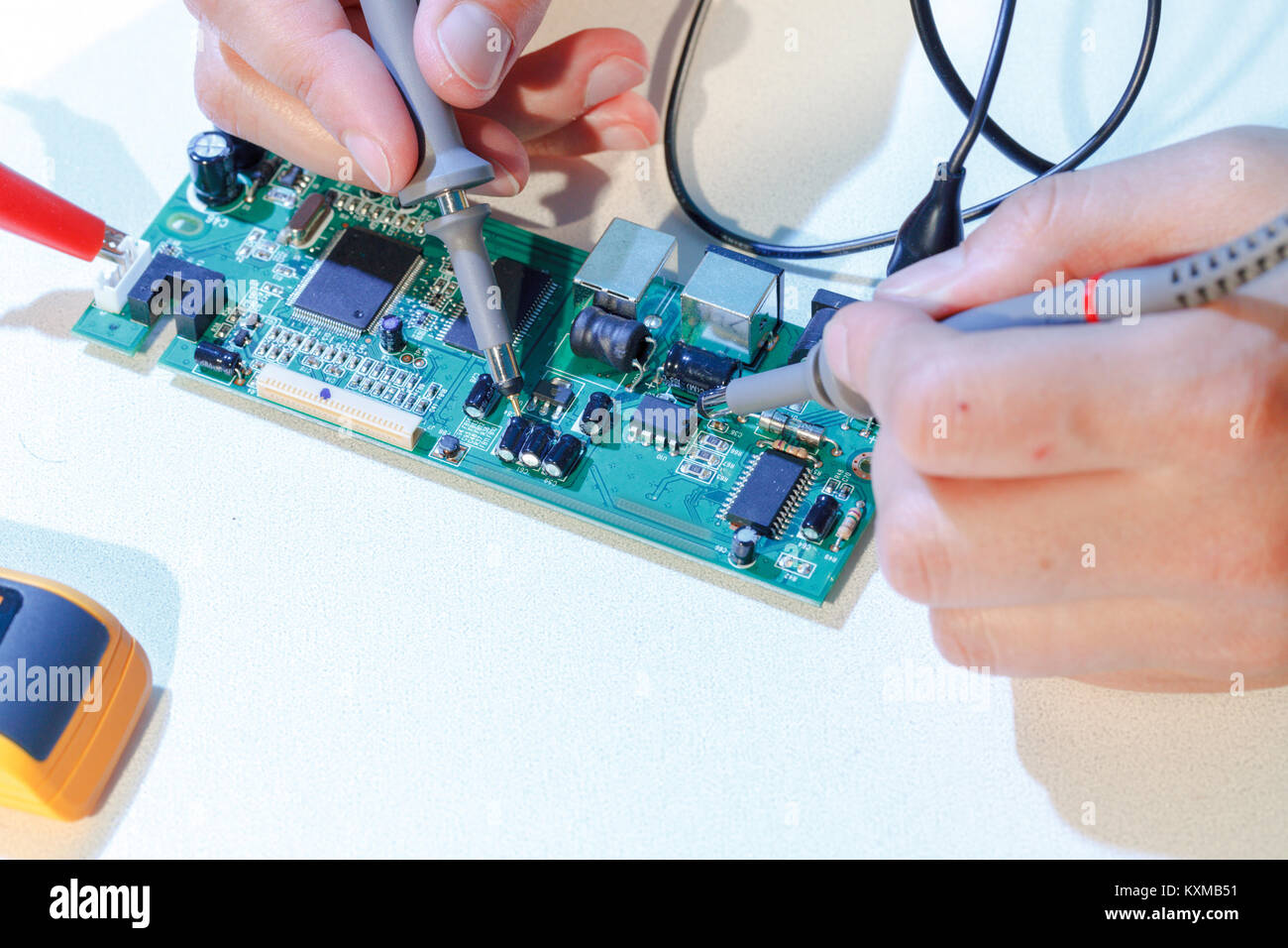 Repair of printed circuit boards with chips Stock Photo - Alamy