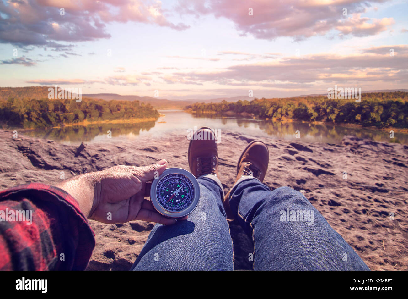Person with compass hi-res stock photography and images - Alamy