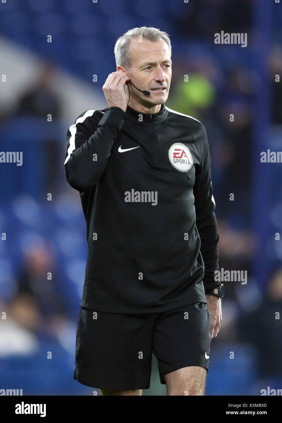 Referee Martin Atkinson warm up before the Carabao Cup Semi Final ...