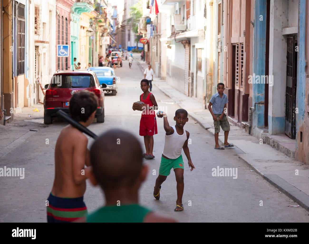 Cuban children playing baseball in the street in Havana, Cuba Stock ...