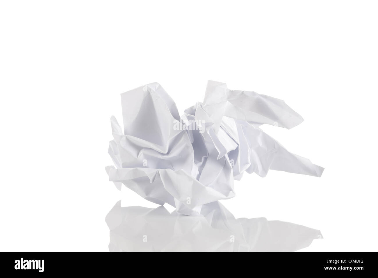 Crumbled paper ball trash close up over white background Stock Photo ...