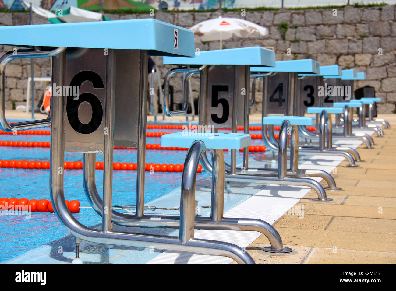 View of a row of diving boards in a pool Stock Photo - Alamy