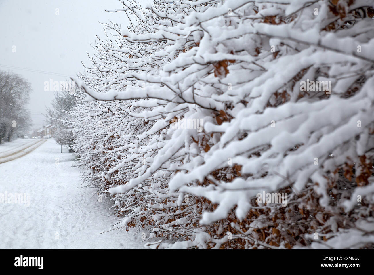 The first snow of winter falls in the historic market town of Thrapston ...