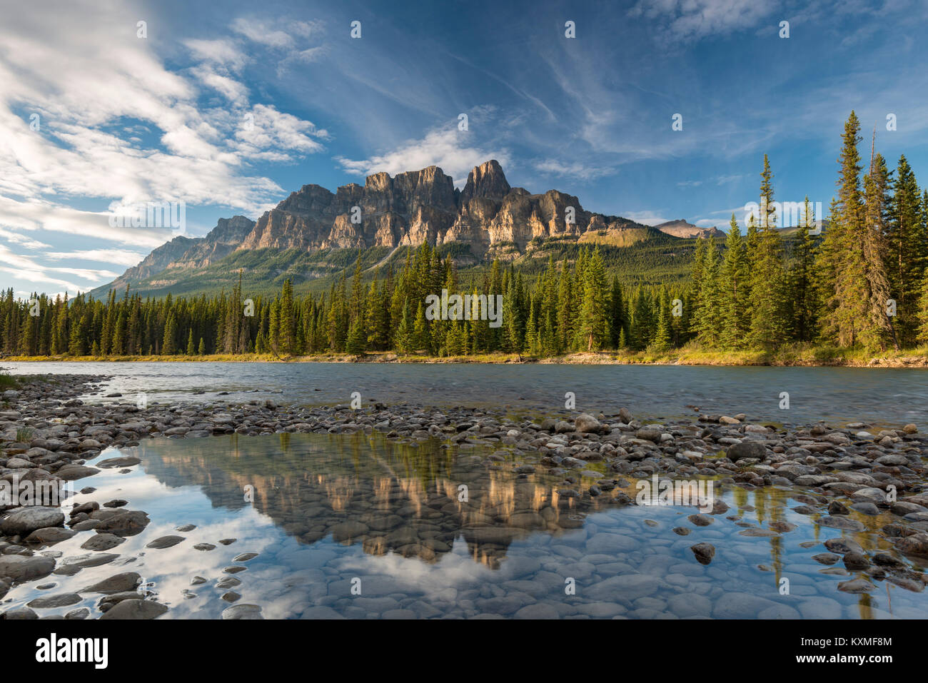 Castle Mountain reflects in a small pool of Bow River, Banff National Park, Alberta, Canada ...