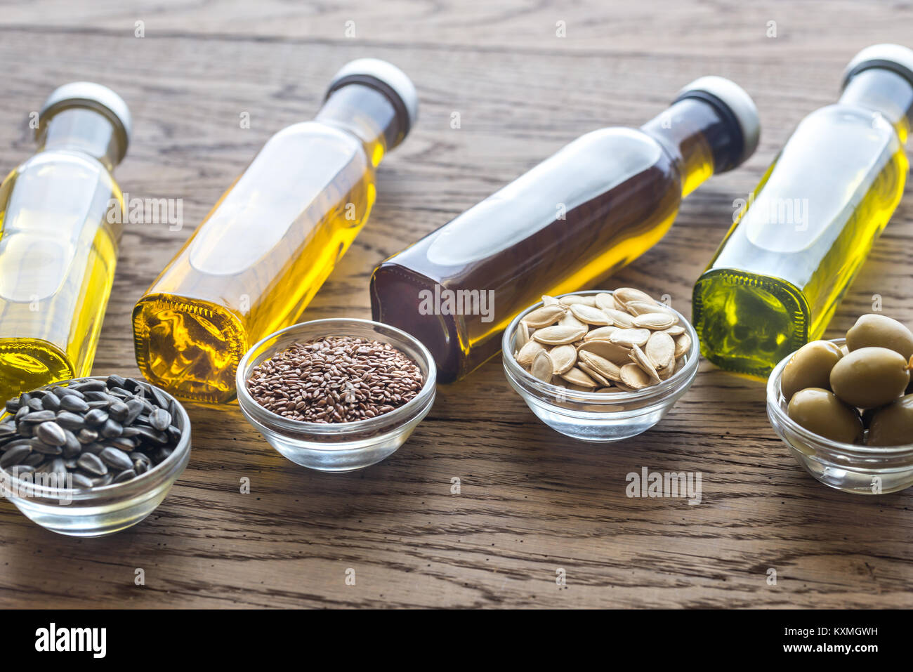 Bottles with different kinds of vegetable oil Stock Photo - Alamy