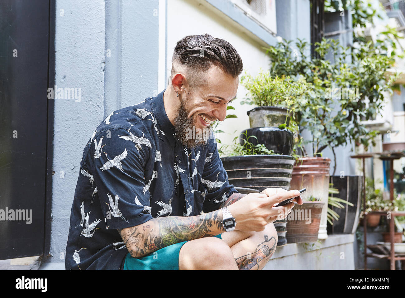 Person sitting on doorstep hi-res stock photography and images - Alamy