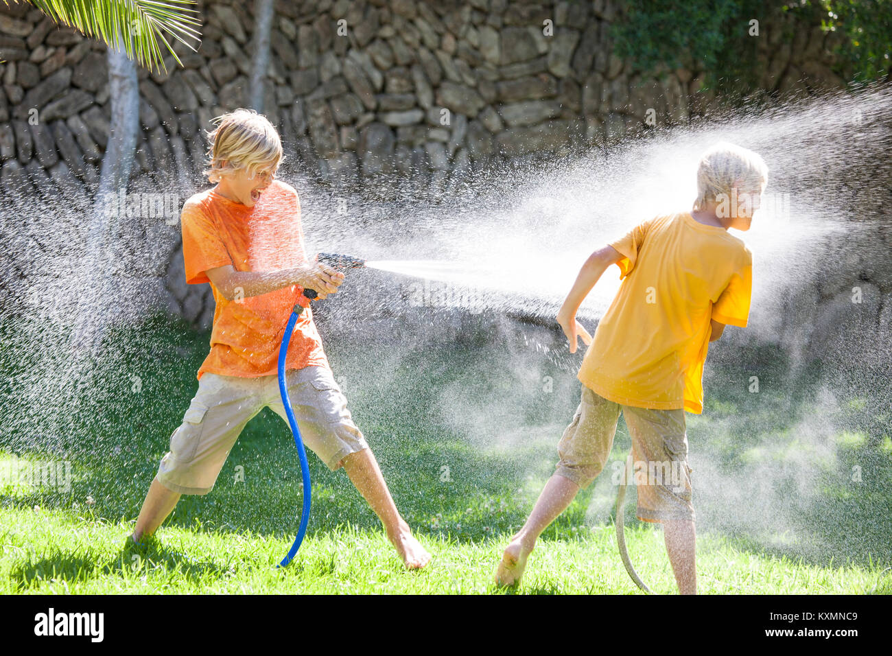 Hose spraying ground hi-res stock photography and images - Alamy