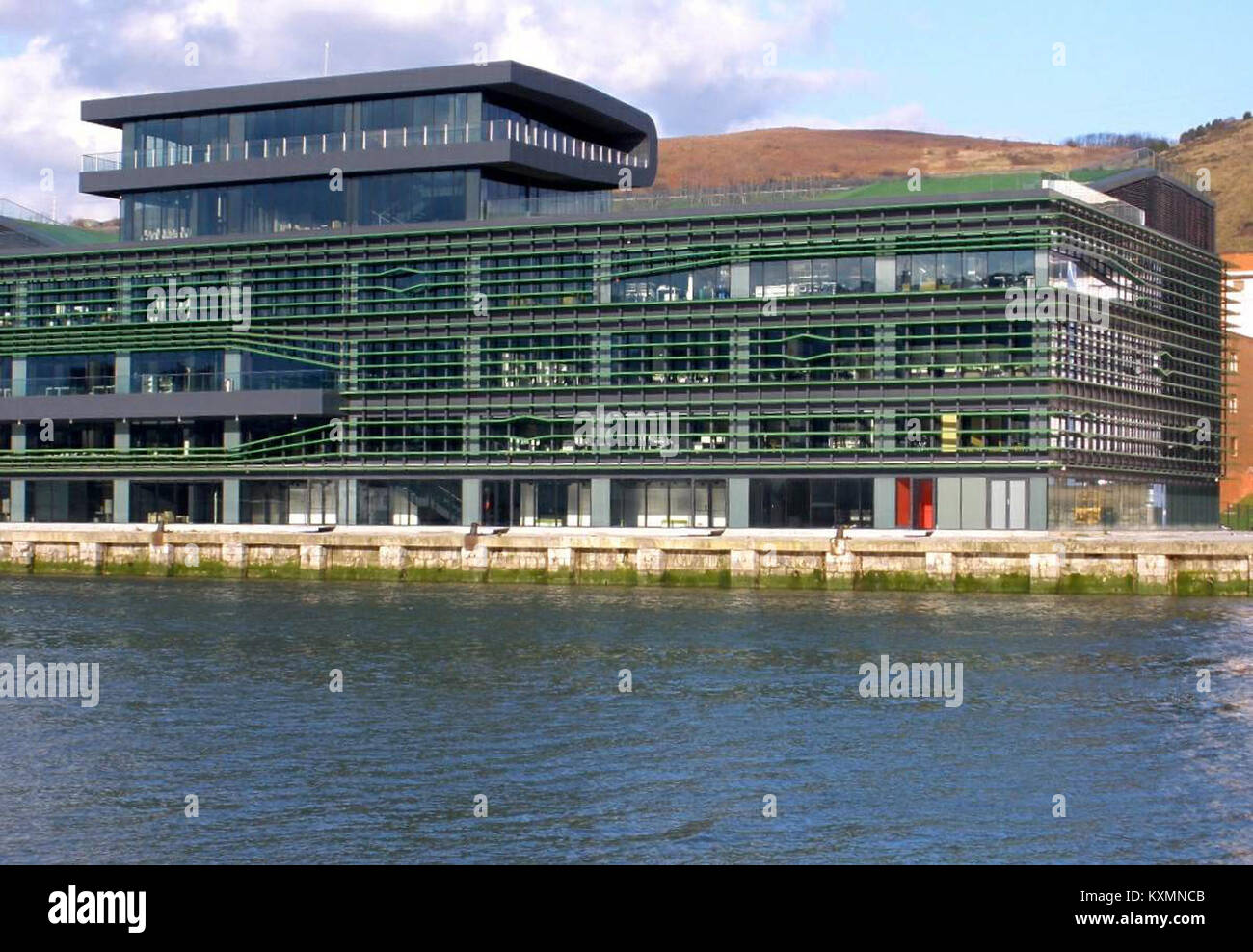 This image references the headquarters of the engineering group IDOM ...